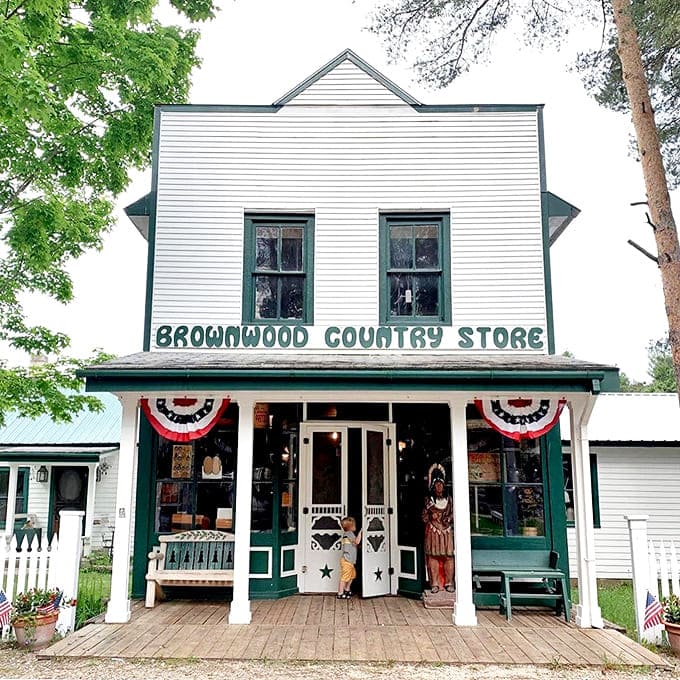 The welcoming facade of Brownwood Country Store invites travelers to step back in time &ndash; patriotic bunting and screen doors promising authentic pleasures within.