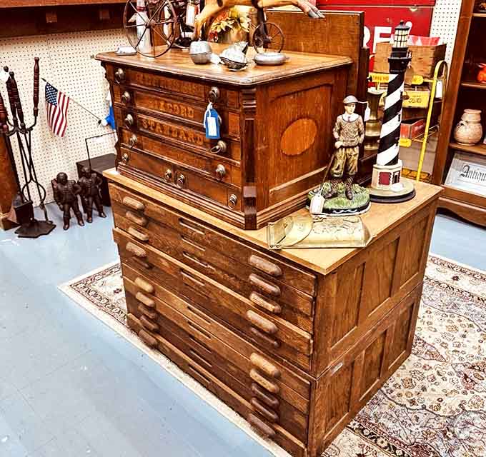 This magnificent wooden cabinet has probably held more secrets than a therapist. The craftsmanship speaks of an era when furniture was built to outlast its owners.