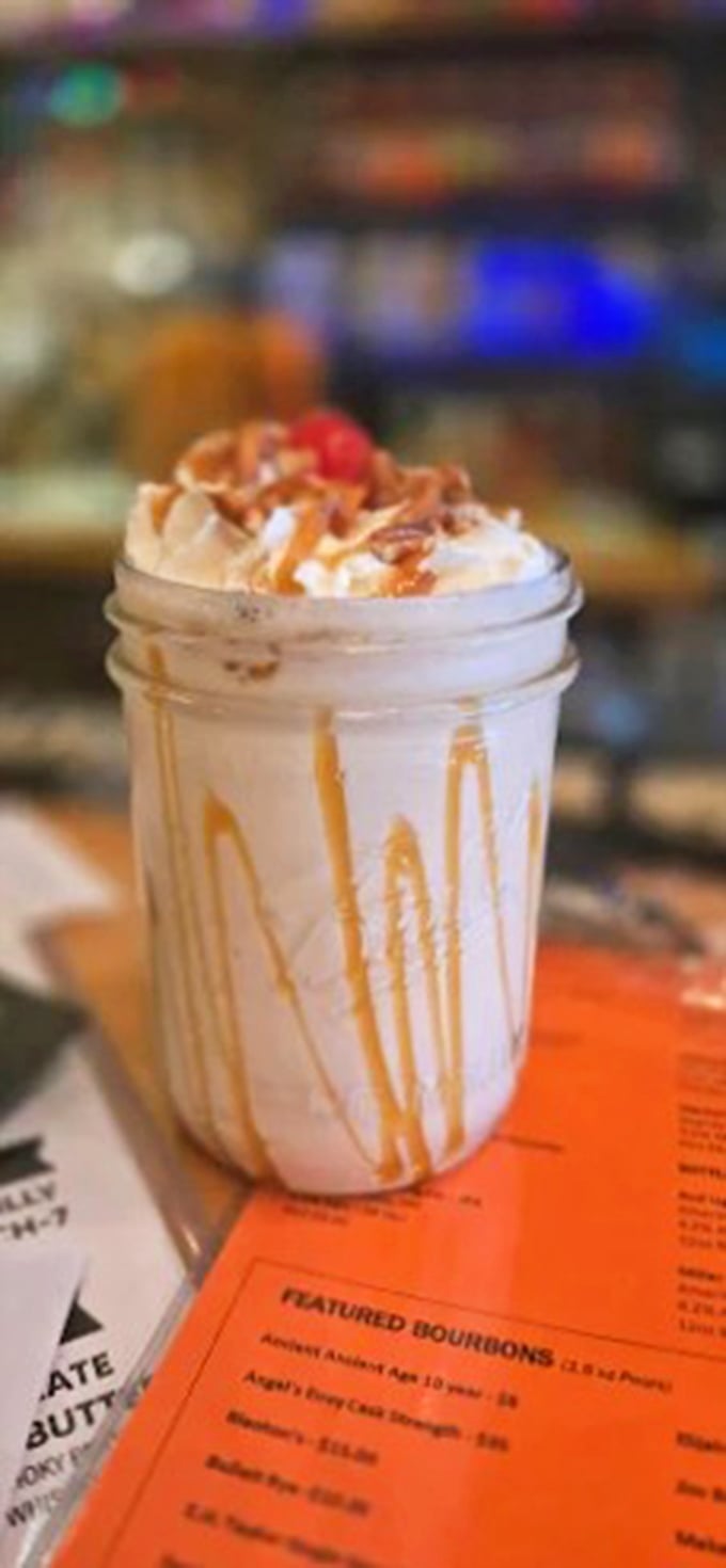 The Proper Pig's vintage-style signage – like a beacon of hope for the hungry and a promise of smoky delights within.