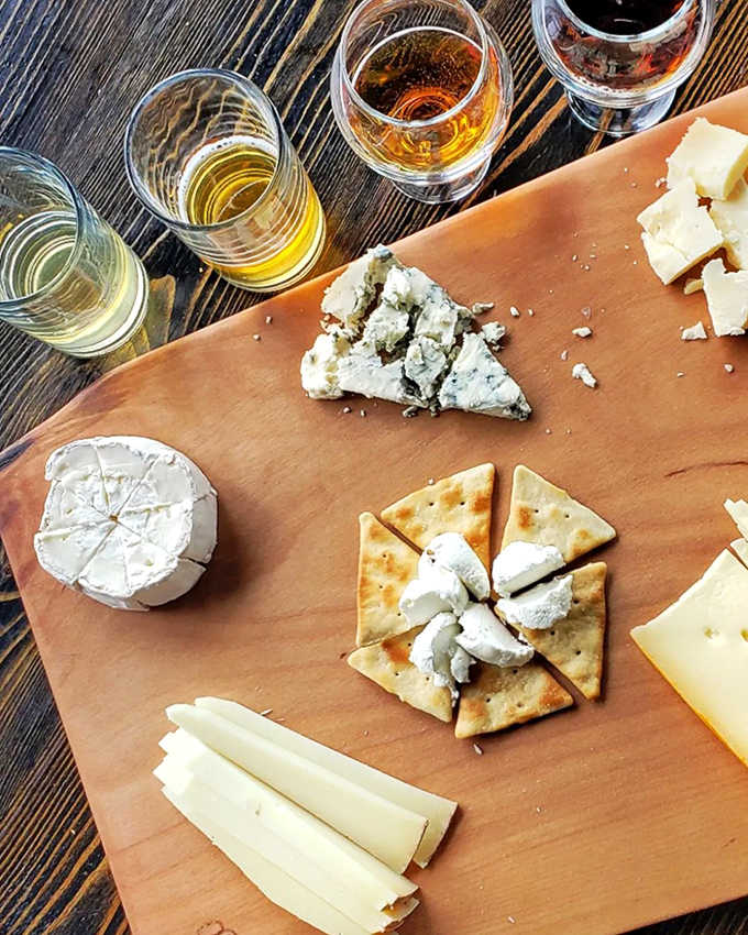 A cheese board that would make Wisconsin nervous sits ready to complement Boom Island's Belgian-inspired brews.
