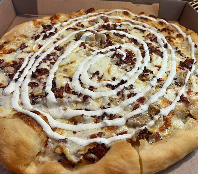 The Chicken Bacon Ranch pizza &ndash; where three comfort food favorites join forces like culinary superheroes to save you from boring dinner options.