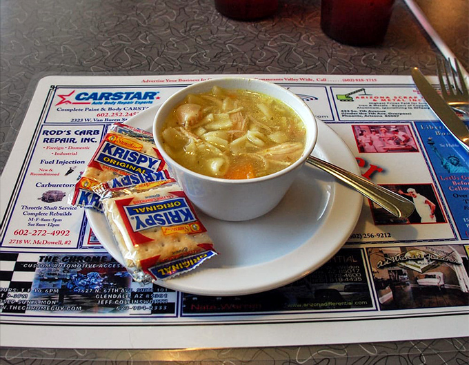 Chicken noodle soup that tastes like someone's grandmother is in the kitchen, stirring memories into every heartwarming spoonful.