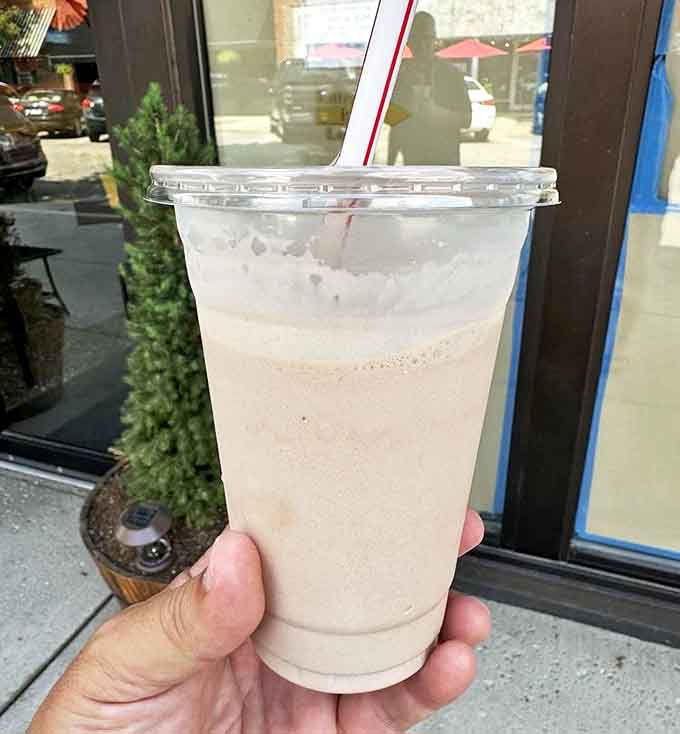 This chocolate malt isn't just a drink &ndash; it's a time machine in a cup that transports you back to when soda jerks ruled and straws were paper.