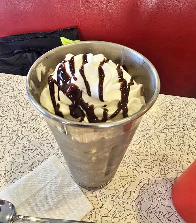 This isn't just a beverage; it's a dessert that requires serious straw negotiation and rewards patience with creamy chocolate bliss.
