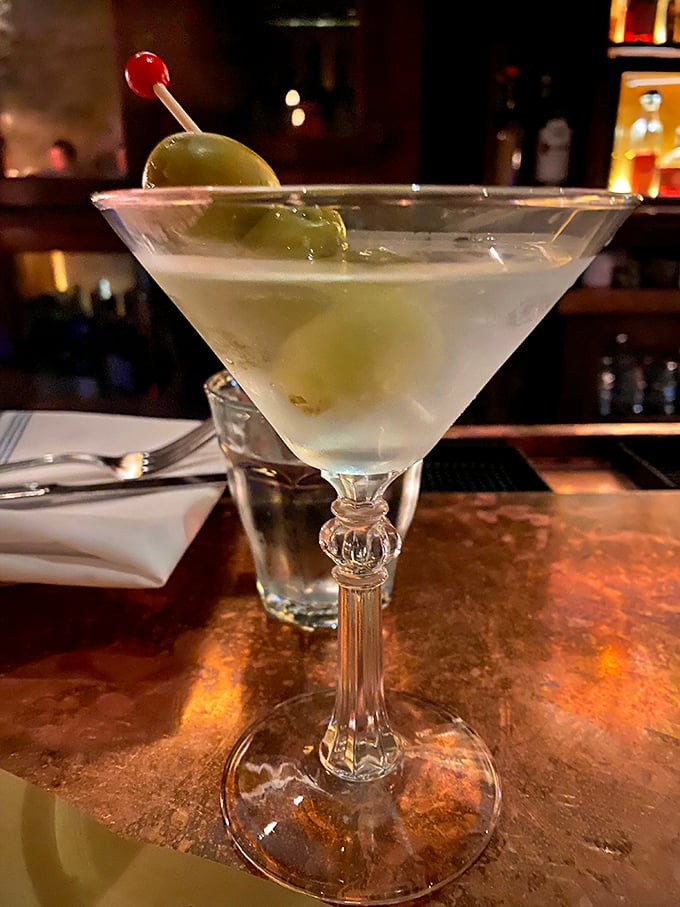 A perfectly crafted martini &ndash; the liquid equivalent of a tailored suit, elegant and timeless with olives adding just the right savory punch.