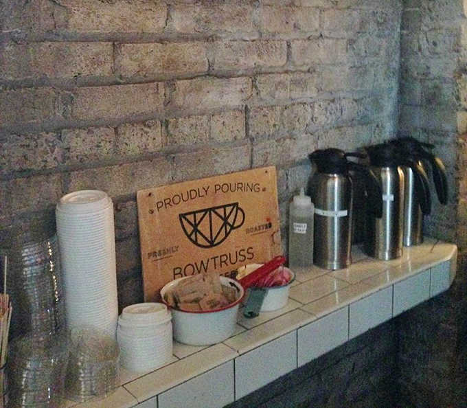The coffee station stands ready for self-service, because when you're in donut paradise, caffeine is the necessary companion for the journey.