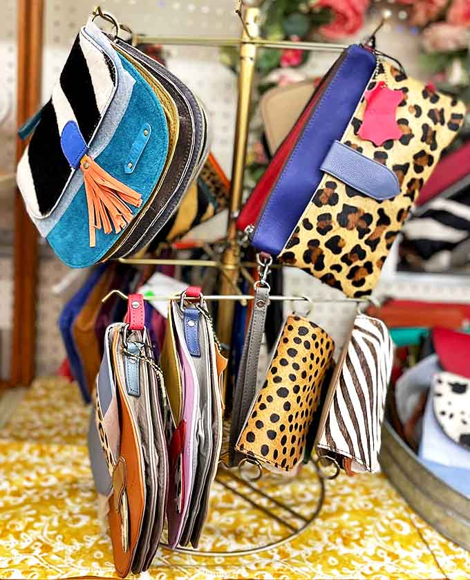 Fashion meets function with these stylish coin purses, proving Sauser's understands that even the most practical shoppers appreciate a pop of leopard print.