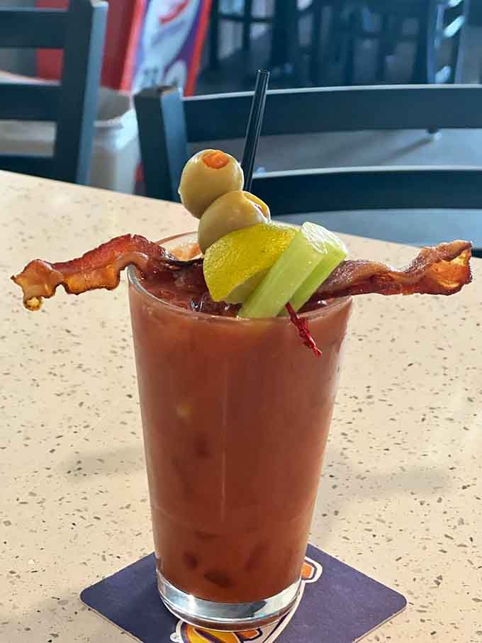 That Bloody Mary comes loaded with bacon and pickles, basically a salad and breakfast in drinkable form.