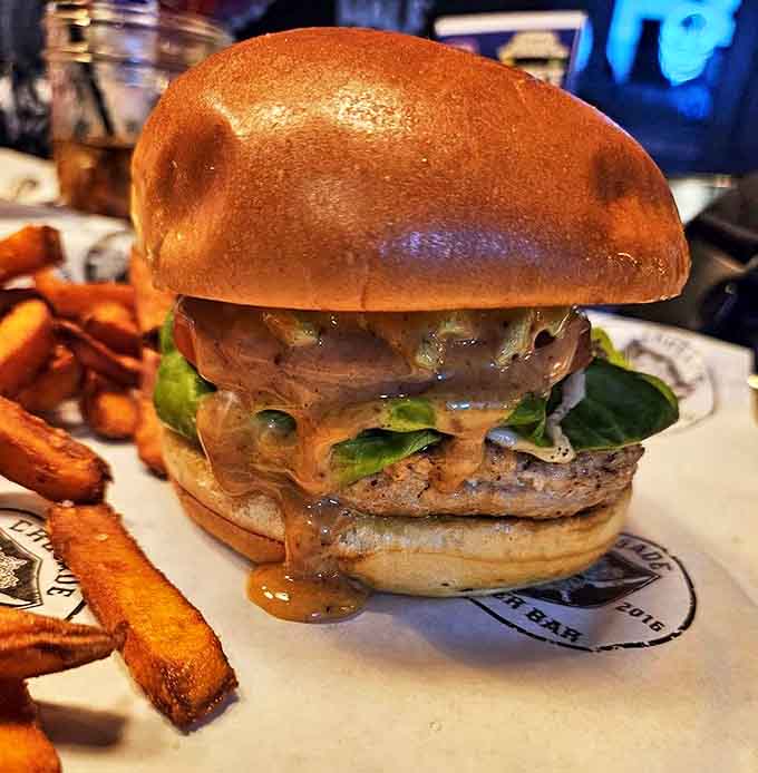 This isn't just a burger &ndash; it's a masterpiece of balance and flavor, with fresh greens and a perfectly toasted bun that somehow makes gluttony seem sophisticated.