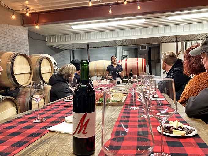 The outdoor patio transforms into a gathering place at sunset, where strangers become friends over shared bottles.