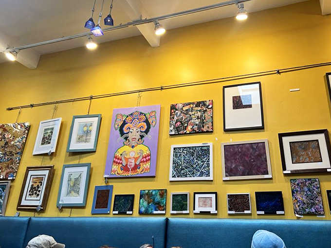 Rock legends watch over diners from vibrant walls, creating an atmosphere that's part art gallery, part comfort food sanctuary.