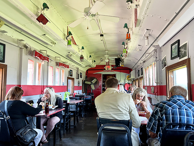 Sunlight streams through the train car windows, illuminating a dining experience that's truly off the rails in all the right ways.