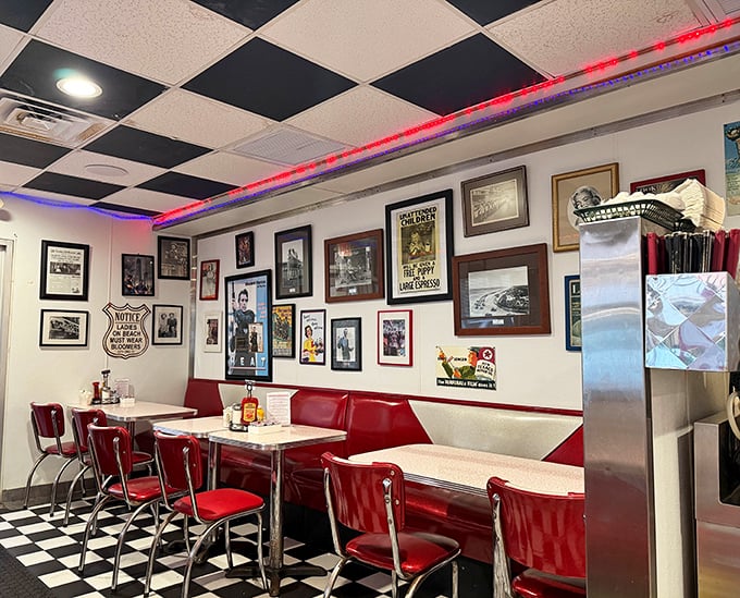 The dining area's walls tell stories through framed memorabilia, creating a museum of American pop culture you can enjoy between bites.