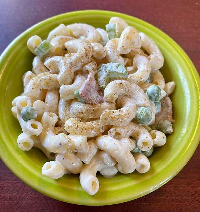Creamy, tangy macaroni salad that hits all the right notes as the perfect sidekick to any hot dog selection.