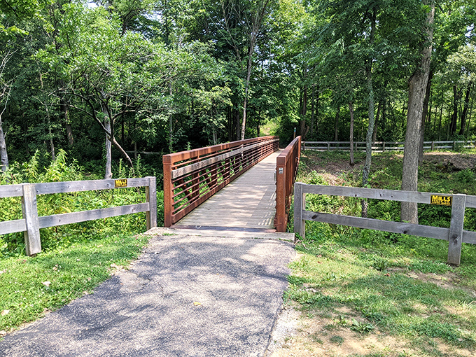 This inviting footbridge doesn't just connect two sides of the park&mdash;it's the gateway to adventure, no passport required.