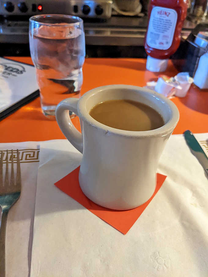 Fred's coffee comes in thick ceramic mugs that warm your hands on chilly Ohio mornings – simple, strong, and endlessly refilled.