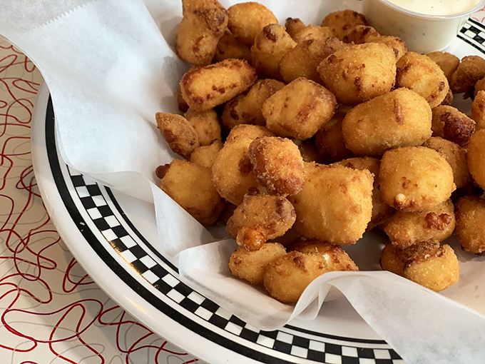 These cheese curds aren't just fried &ndash; they're transformed into golden nuggets of Wisconsin pride that squeak with every bite.