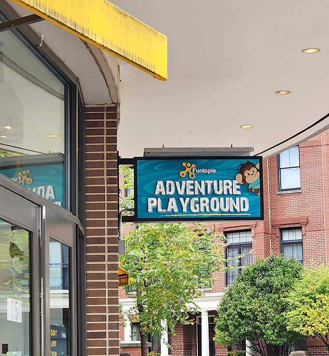 The Funtopia Adventure Playground sign promises exactly what it delivers &ndash; a sanctuary of structured chaos where memories are built one climb at a time.
