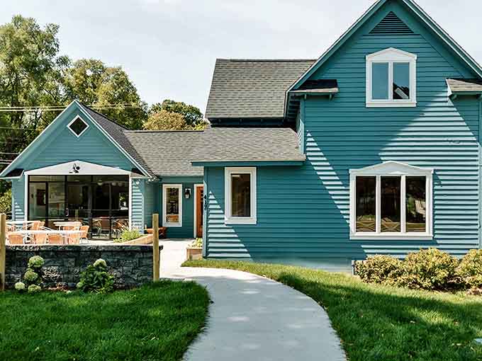 Gilchrist Farm Winery's teal facade houses liquid treasures that capture Michigan's terroir in every carefully crafted bottle.