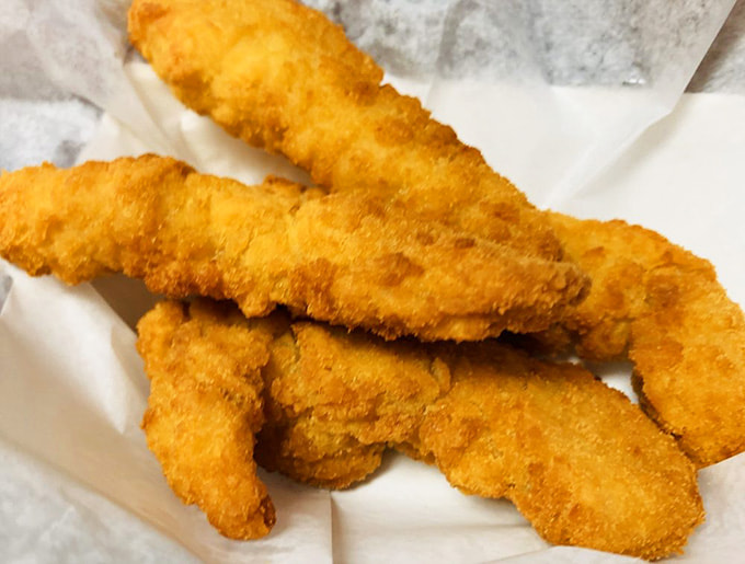 Golden chicken tenders that prove Hot Dog Heaven can handle poultry with the same expertise they bring to their namesake specialty.