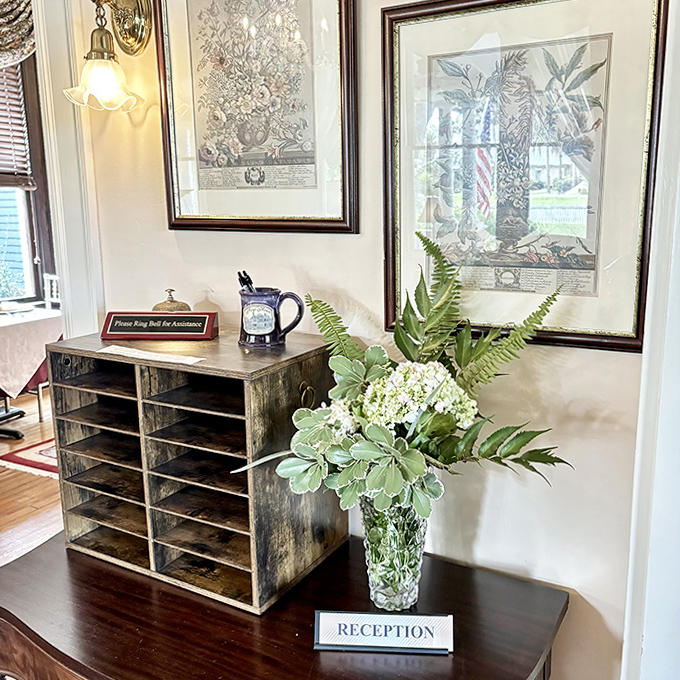 Vintage charm meets modern hospitality at this welcoming check-in area, where your journey through time officially begins.