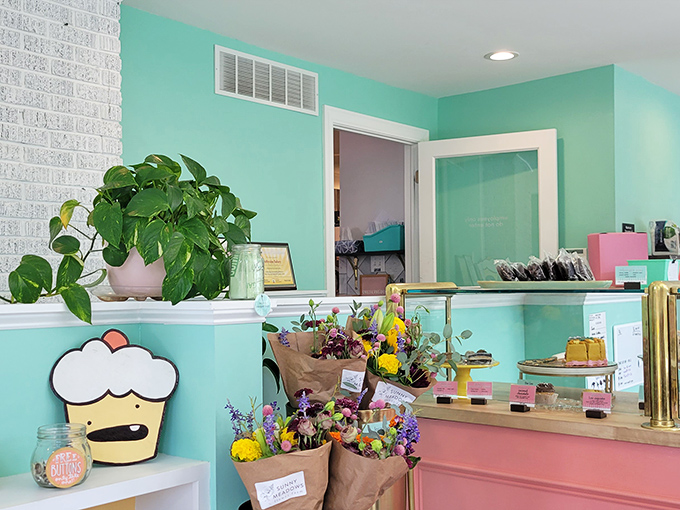 Turquoise walls and organized displays create a calm oasis where the hardest decision you'll make is which treat deserves your immediate attention.