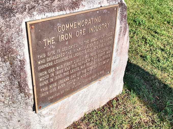 This plaque commemorates the iron ore industry with the kind of reverence usually reserved for war memorials, because mining was its own kind of battle.
