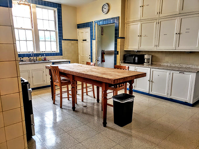 Kitchen: Blue-trimmed tile work and gleaming countertops prove that even utilitarian spaces weren't exempt from the estate's commitment to beauty.