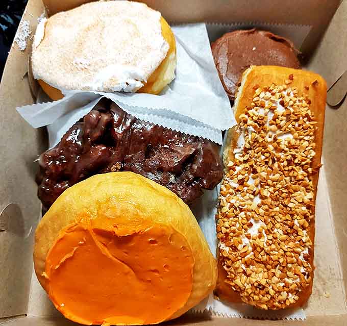 The box of dreams &ndash; each donut a different adventure, from chocolate-dipped long johns to peanut butter perfection.