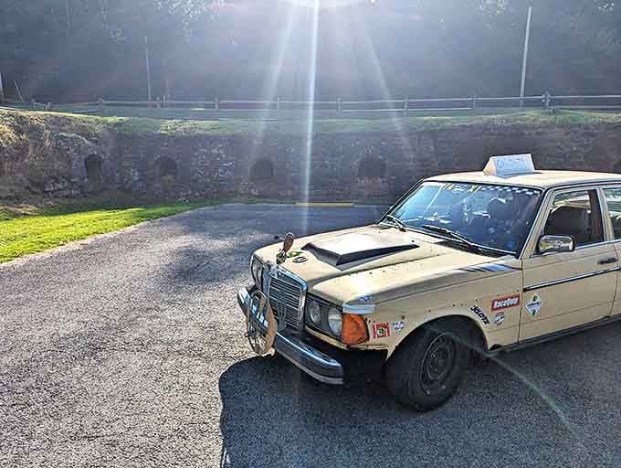 A vintage Mercedes adds unexpected character to the scene, two relics from different eras sharing a moment in the Ohio sunshine.