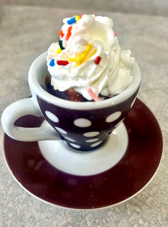 The perfect finale &ndash; a miniature sundae served in a polka-dotted cup proves good things come in small packages, especially when topped with sprinkles.