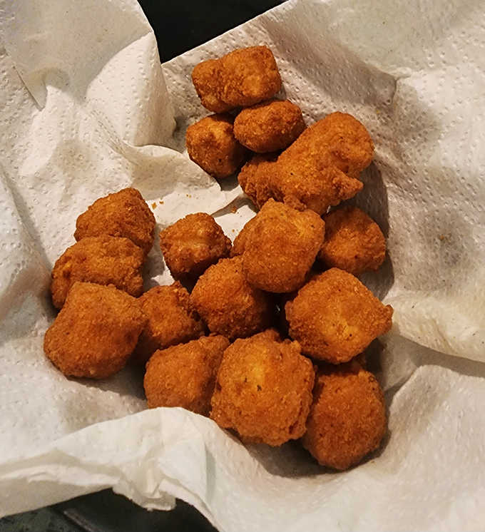 These golden mozzarella cheese nuggets are little orbs of melted joy, crispy on the outside and gloriously gooey on the inside.