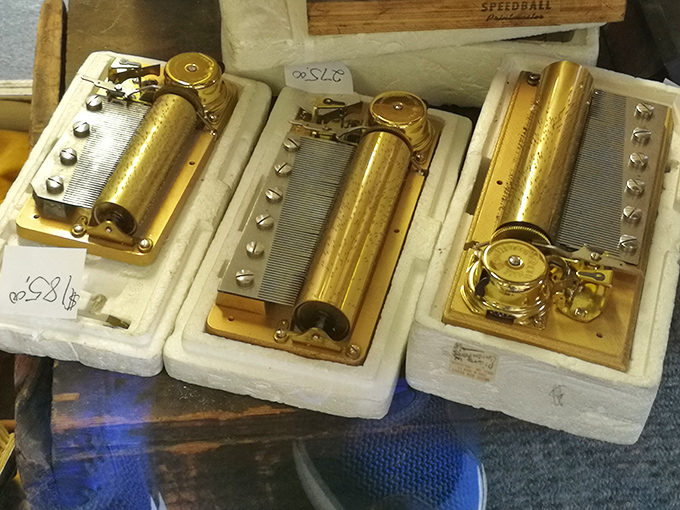 Music Boxes: These golden mechanical marvels once provided entertainment before electricity &ndash; now they're conversation pieces waiting to play their tinkling tunes again.