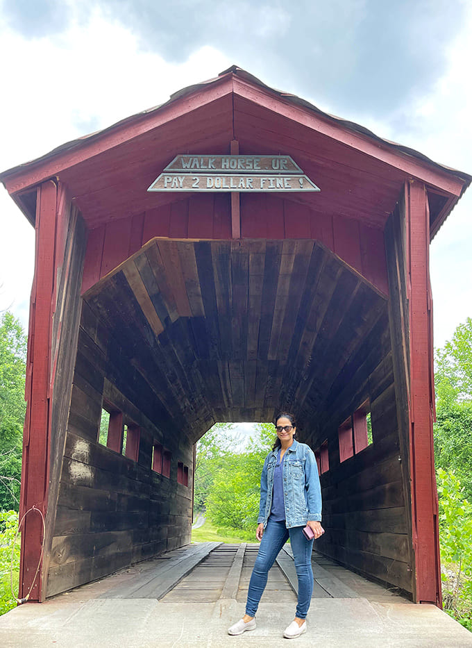 Walk Horse Or Pay 2 Dollar Fine! warns the sign on this charming covered bridge &ndash; a perfect spot for nostalgic photos.