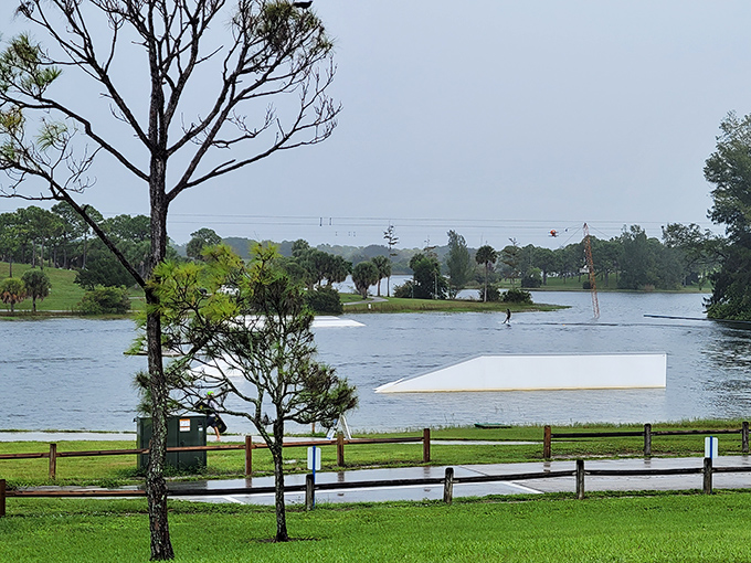 Even on overcast days, the park's vibrant obstacles pop against the moody sky, promising adventures regardless of perfect sunshine.