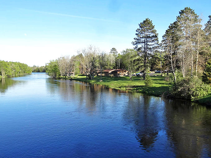 The Paint River winds through lush greenery, creating a peaceful retreat where the only notification you'll get is from Mother Nature herself.