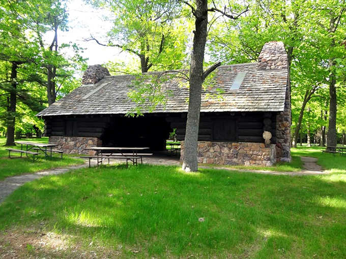 This historic stone and timber pavilion has witnessed generations of family gatherings, its sturdy construction defying decades of Wisconsin weather.