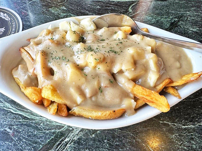 Poitin Poutine: where Irish and Canadian comfort foods collide in a glorious marriage of chips, gravy, and cheese.