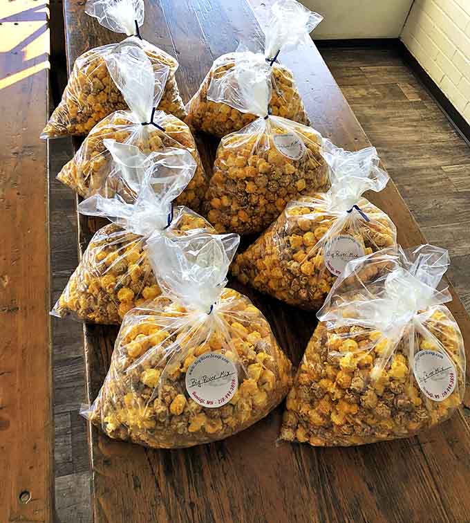 Bags of gourmet popcorn waiting to transform ordinary snack time into an extraordinary flavor adventure.