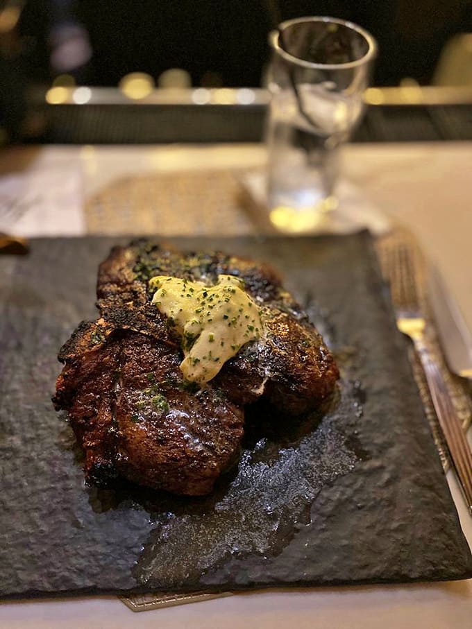 This porterhouse doesn't just feed you &ndash; it tells a tale of two textures, with filet tenderness on one side and strip steak character on the other.