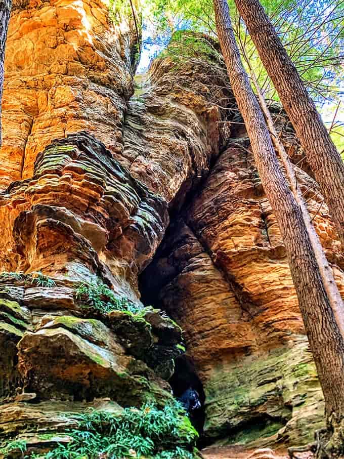 Nature's cathedral: This dramatic rock recess creates a natural amphitheater where even whispers seem to carry special significance.
