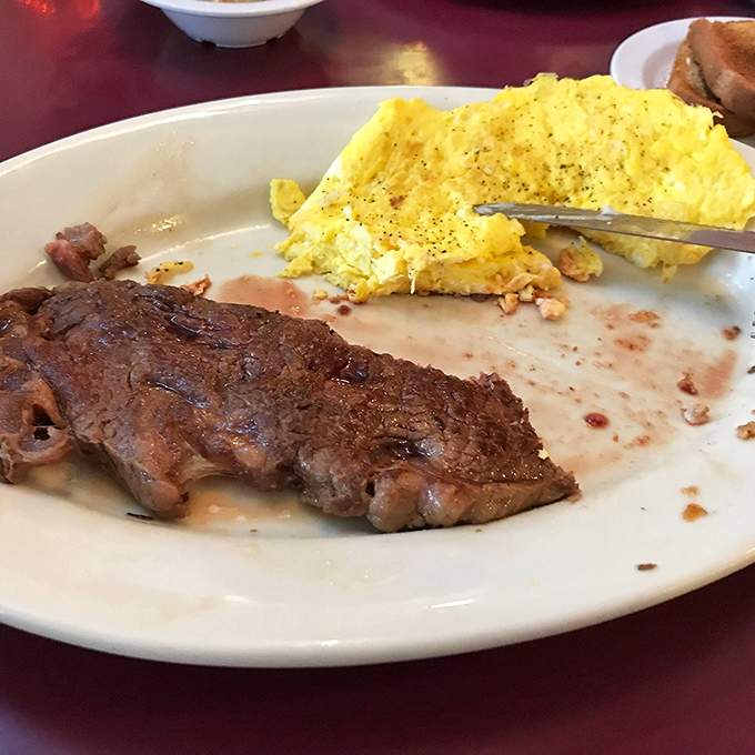 Ribeye steak for breakfast isn't excessive, it's visionary, especially when paired with fluffy scrambled eggs and crispy hash browns.