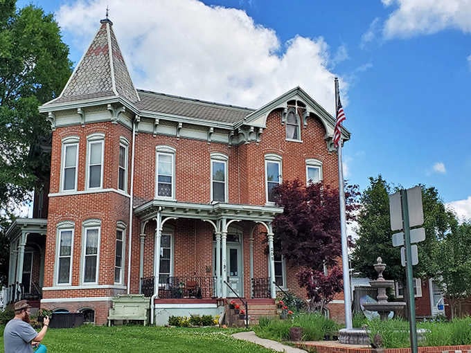 The mansion's stately presence commands attention while somehow remaining inviting rather than intimidating to approaching guests.