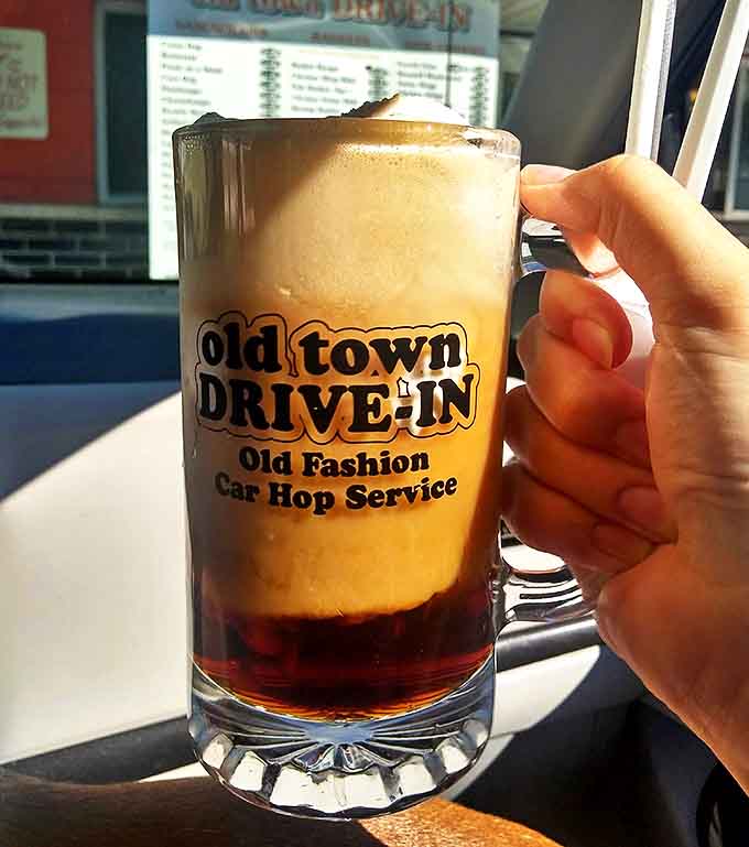 Old-school soda fountain vibes with this root beer float, where creamy vanilla ice cream meets fizzy goodness in perfect harmony.