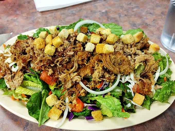 Fresh, colorful, and satisfying &ndash; this salad bowl offers a lighter counterpoint to the menu's more indulgent options, with dressings that add the perfect finishing touch.