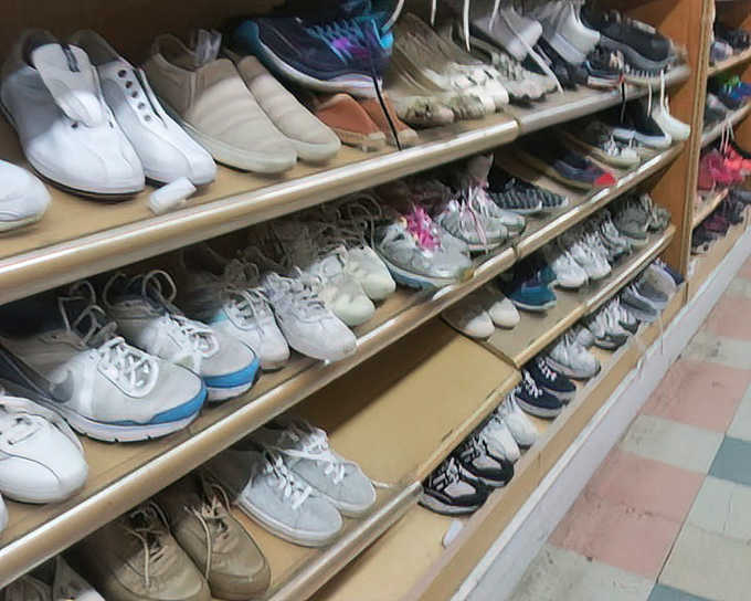 The shoe section: where comfortable loafers, practical sneakers, and statement heels await their Cinderella moment with new owners.