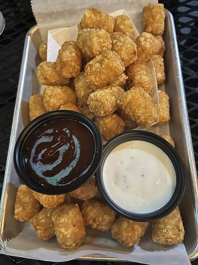 Side of tots: Not just any tater tots&mdash;these golden nuggets are elevated to art form status, crispy outside and fluffy inside, seasoned to perfection.