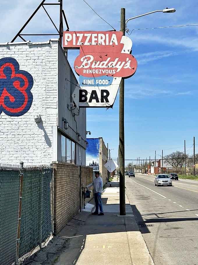 The vintage Buddy's sign has guided hungry pilgrims for decades, a red beacon of pizza salvation on Detroit's Conant Street.