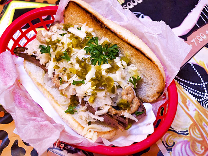 Fresh toppings cascade over this creation like confetti at a cabaret finale &ndash; proof that at O'Betty's, every hot dog gets star treatment.