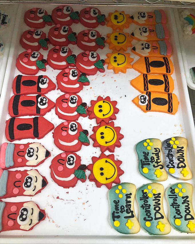 Holiday sugar cookies lined up like colorful soldiers, each one hand-decorated with the kind of patience modern life rarely allows for anymore.